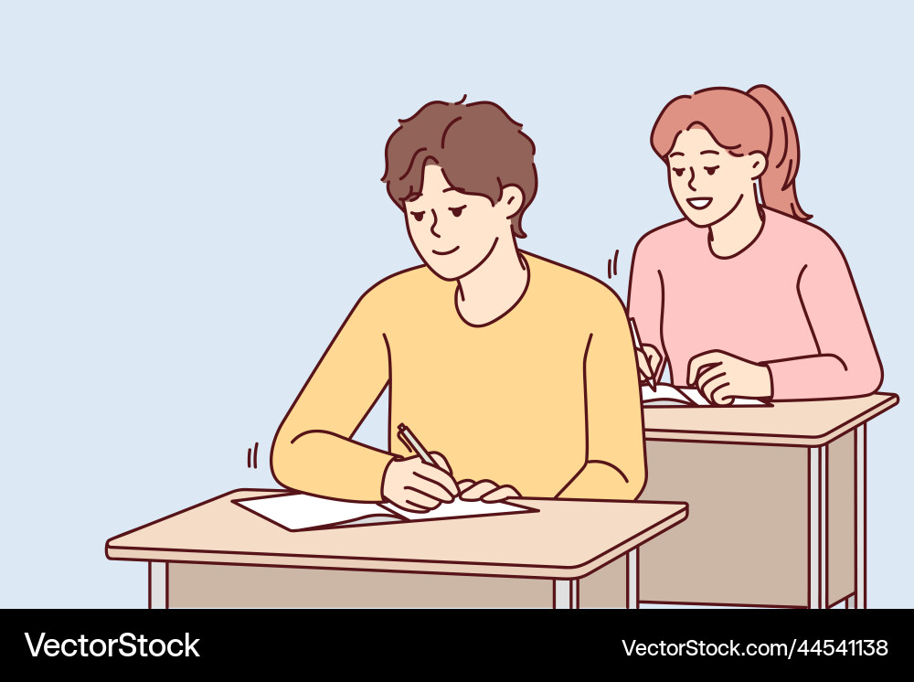 Smiling students sit at desk writing at lesson Vector Image