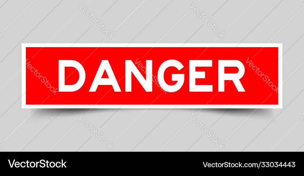 Square red sticker label in word danger on gray Vector Image