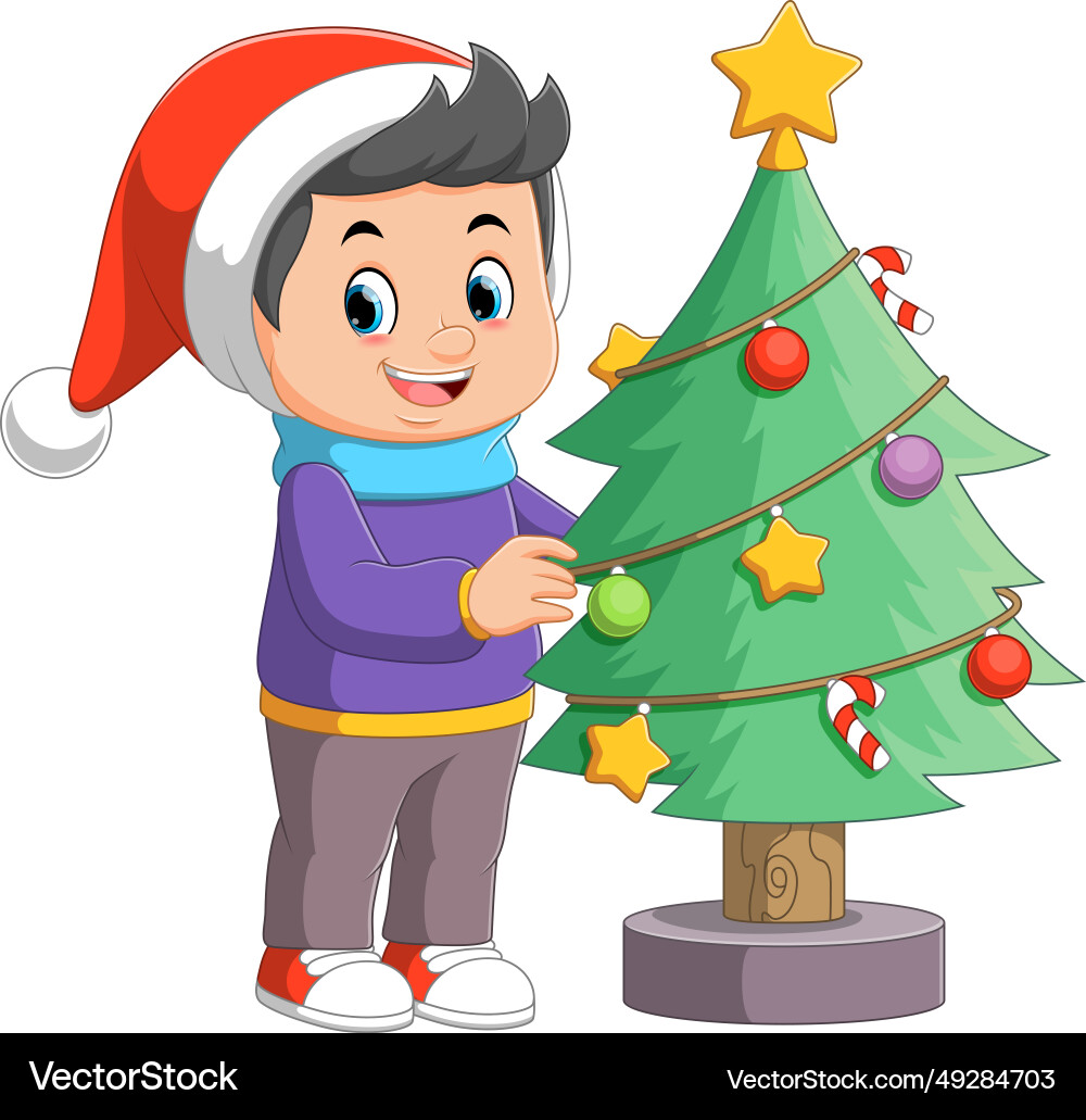 Cartoon little boy decorating a christmas tree Vector Image