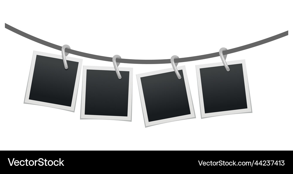 Photo frames hanging on rope attached with clothes