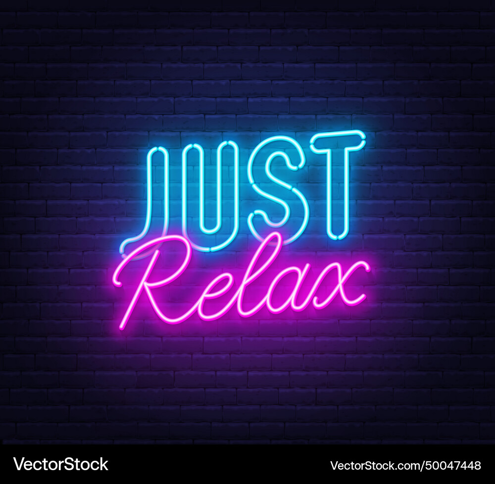 Just relax neon lettering on brick wall background
