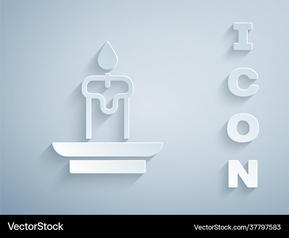 Paper cut burning candle icon isolated on grey Vector Image
