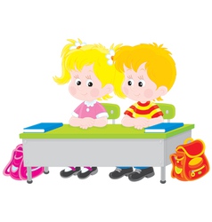 School children at a desk Royalty Free Vector Image