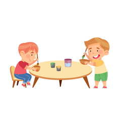 Multiracial children sitting around round table Vector Image